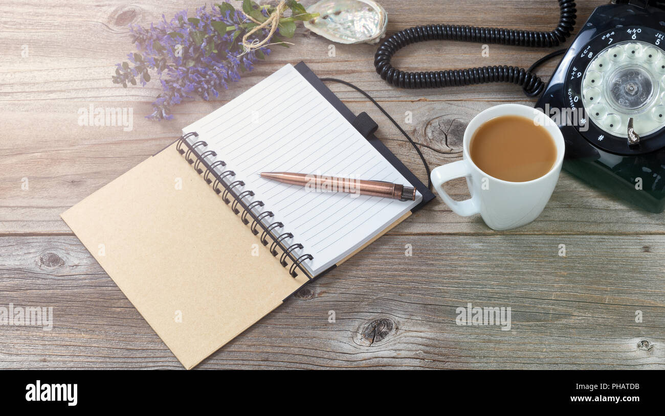 Antique desktop objects and nature decorations with bright hazy light ...