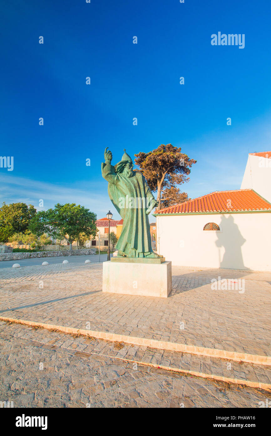 Statue of medieval Croatian bishop Grgur Ninski in historic town of Nin ...