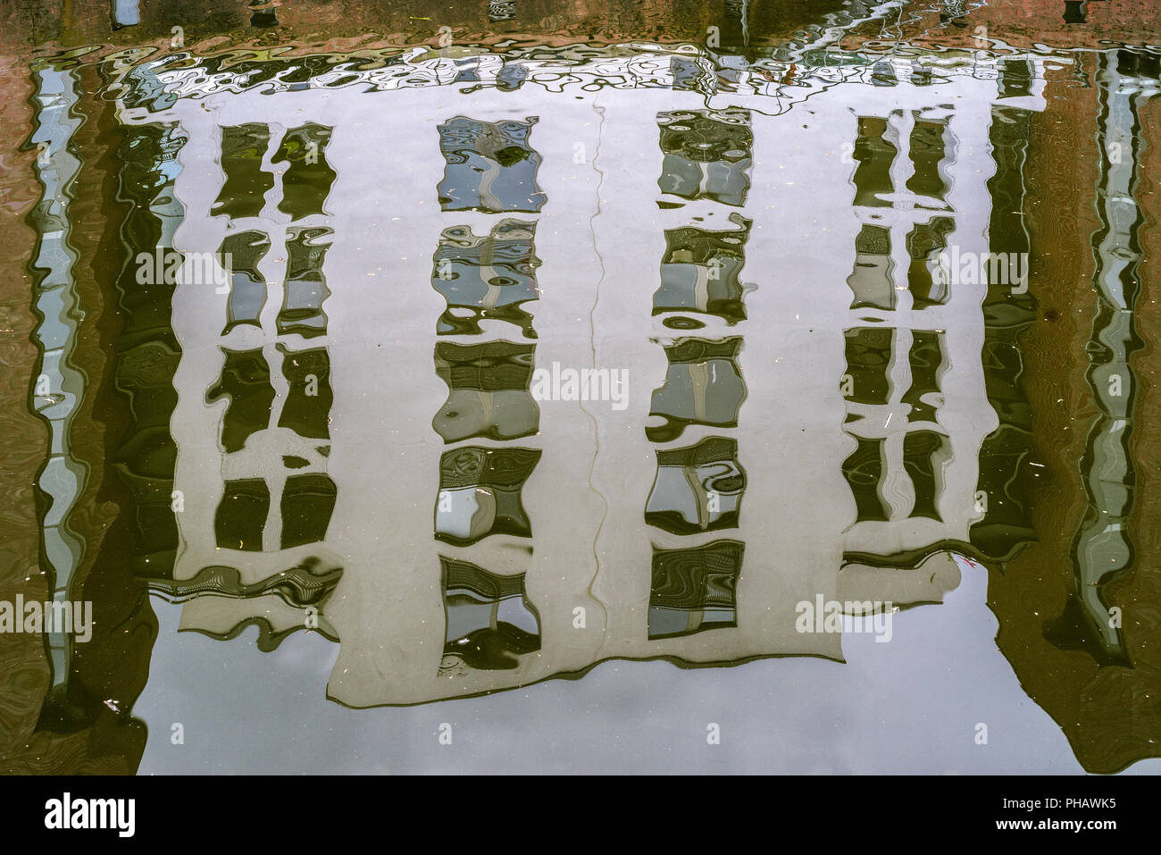 Residential house reflection in water Stock Photo - Alamy
