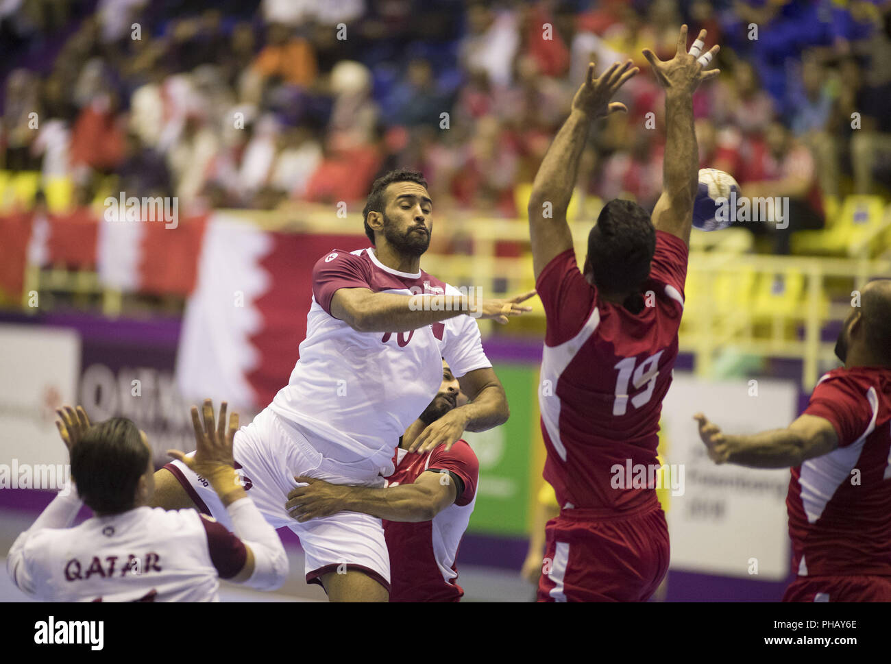 Jakarta, Indonesia. 31st Aug, 2018. Frankis Marzo (2nd L) of Qatar ...