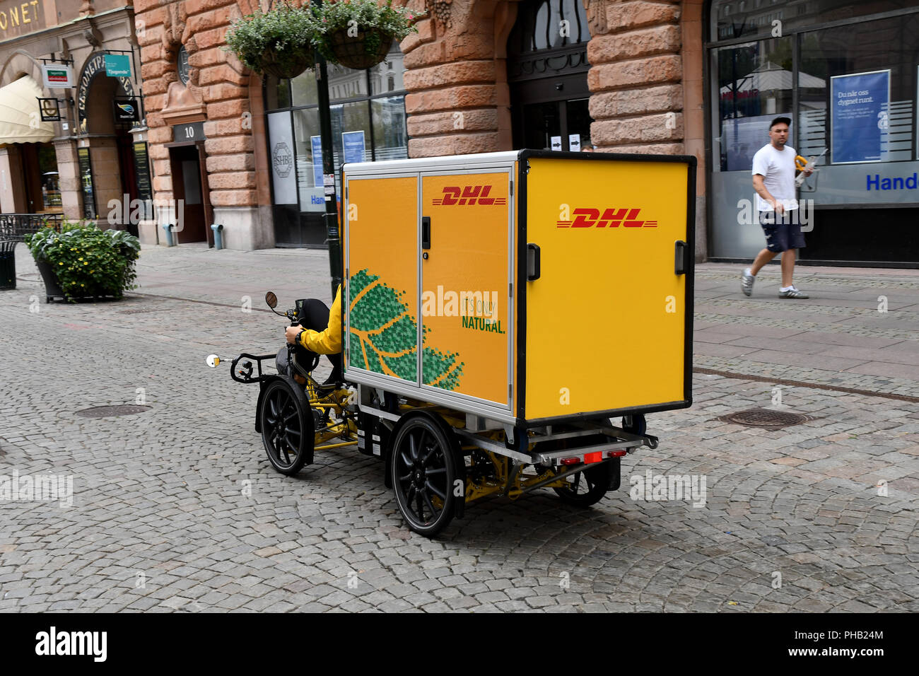 Malmo/Malmoe/MalMö/Sweden 31.August 2018 .DHL deliver by 4 weels bikes ...