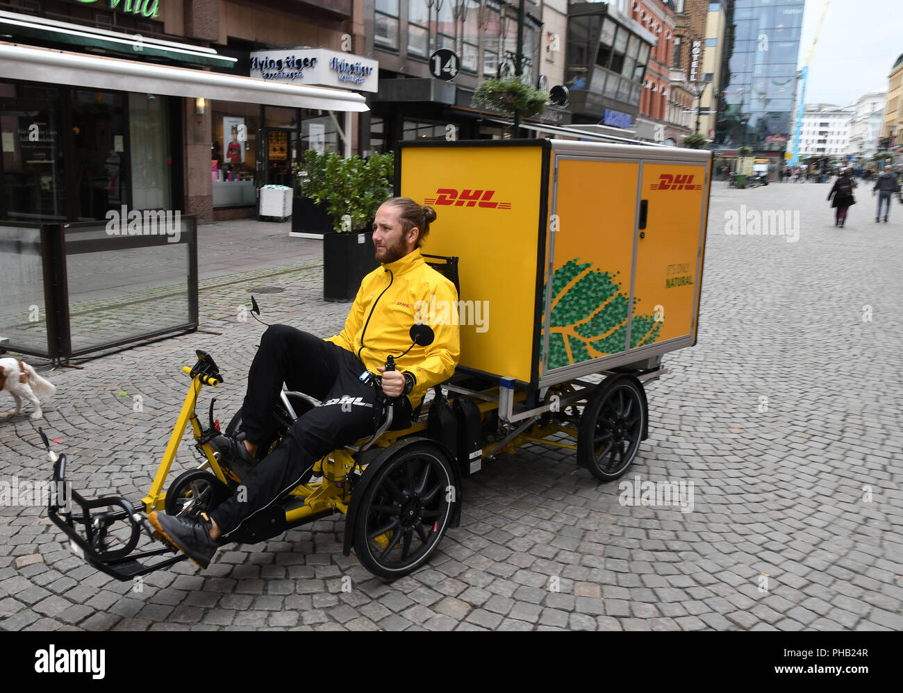 Malmo/Malmoe/MalMö/Sweden 31.August 2018 .DHL deliver by 4 weels bikes ...