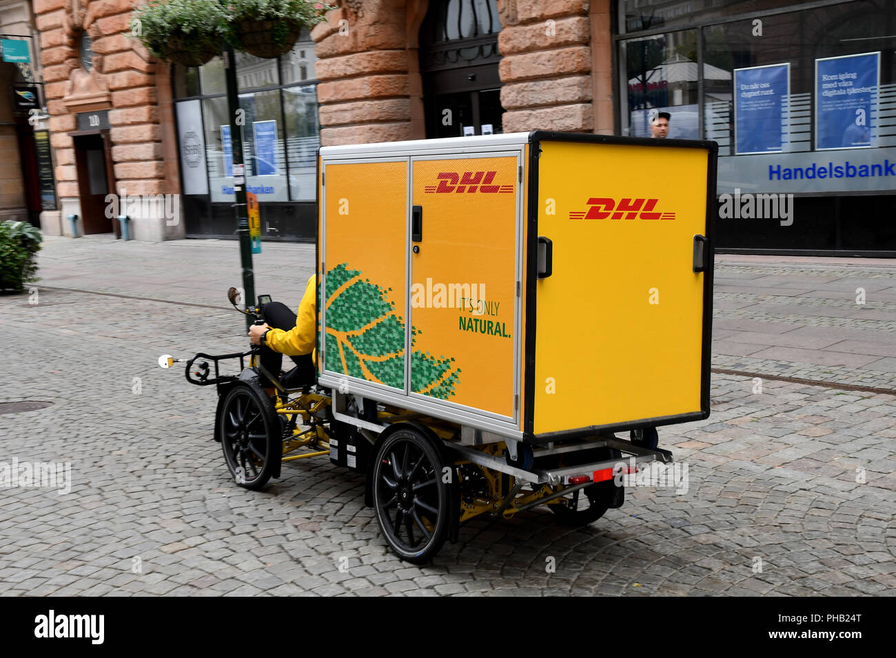 Malmo/Malmoe/MalMö/Sweden 31.August 2018 .DHL deliver by 4 weels bikes ...