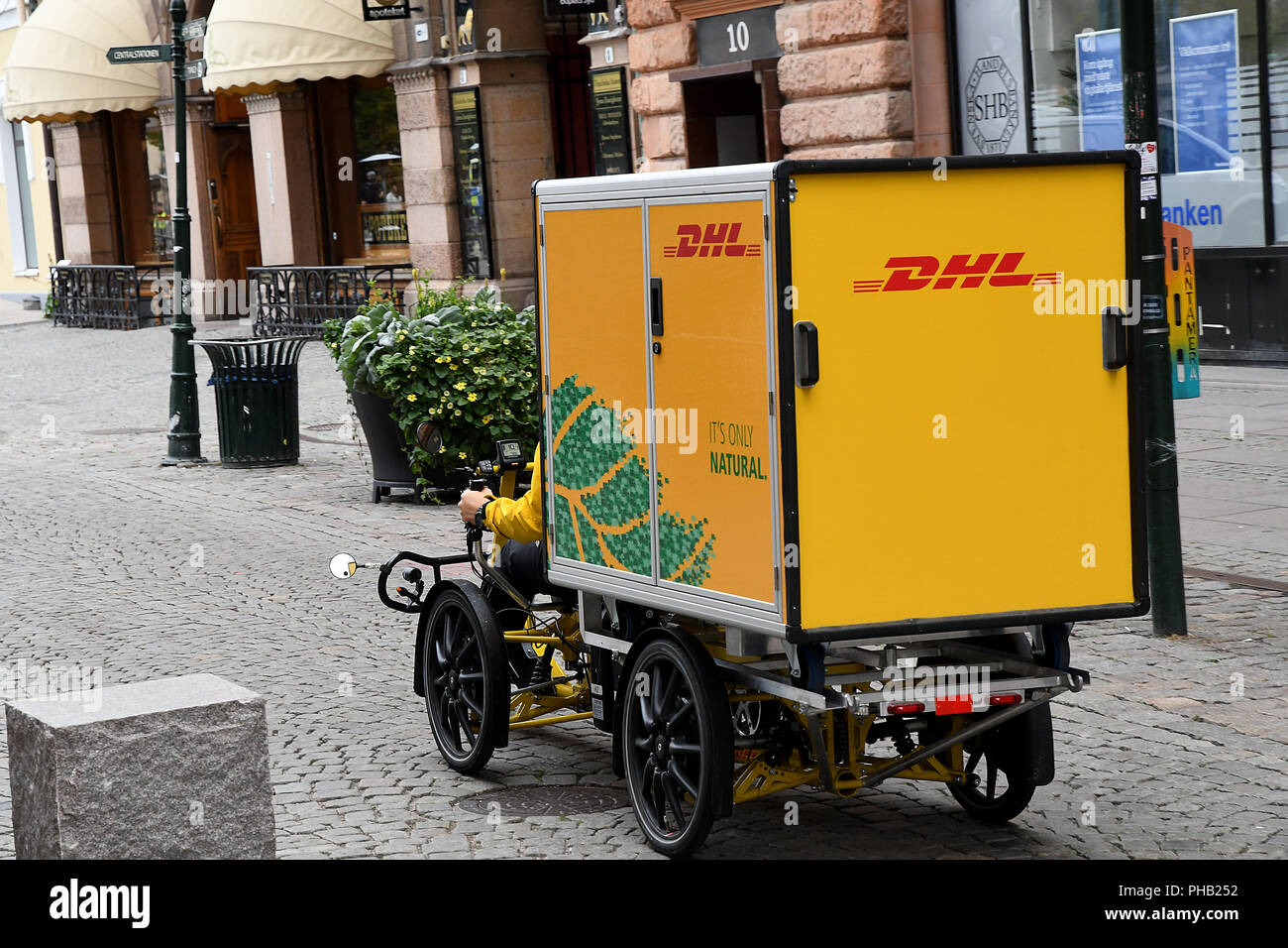 Malmo/Malmoe/MalMö/Sweden 31.August 2018 .DHL deliver by 4 weels bikes ...