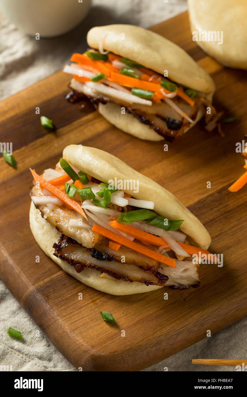 Homemade Steamed Pork Belly Bao Buns with Veggies Stock Photo - Alamy