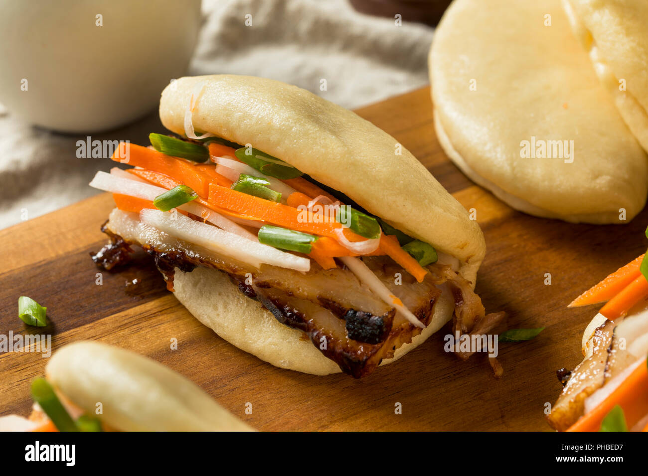 Homemade Steamed Pork Belly Bao Buns with Veggies Stock Photo - Alamy