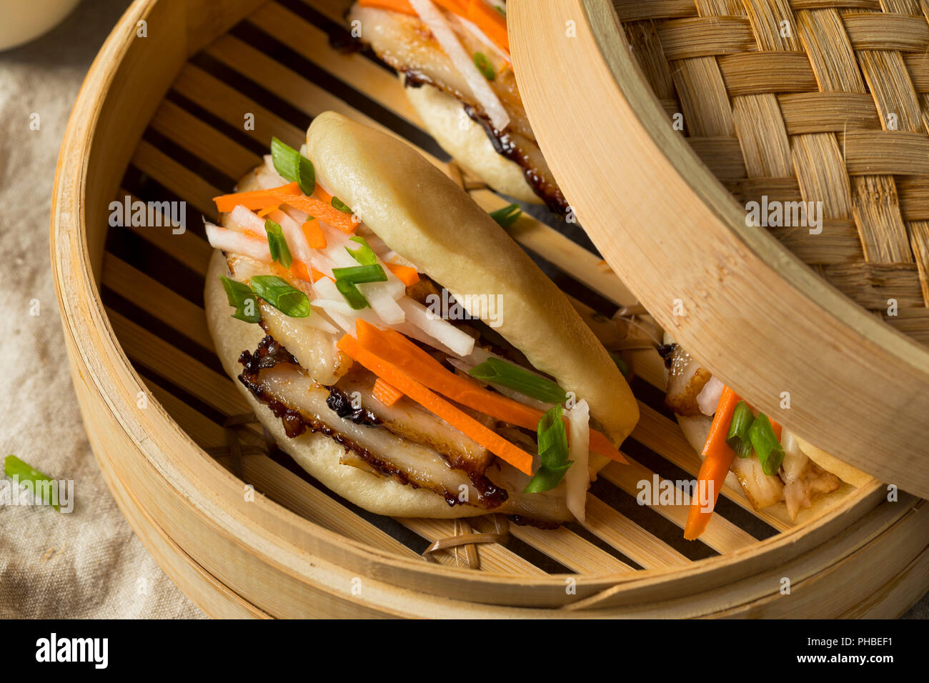 Homemade Steamed Pork Belly Bao Buns with Veggies Stock Photo - Alamy