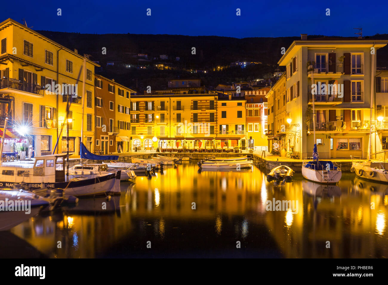 Twilight at the harbour of Castelletto, Brenzone sul Garda, Lake Garda ...