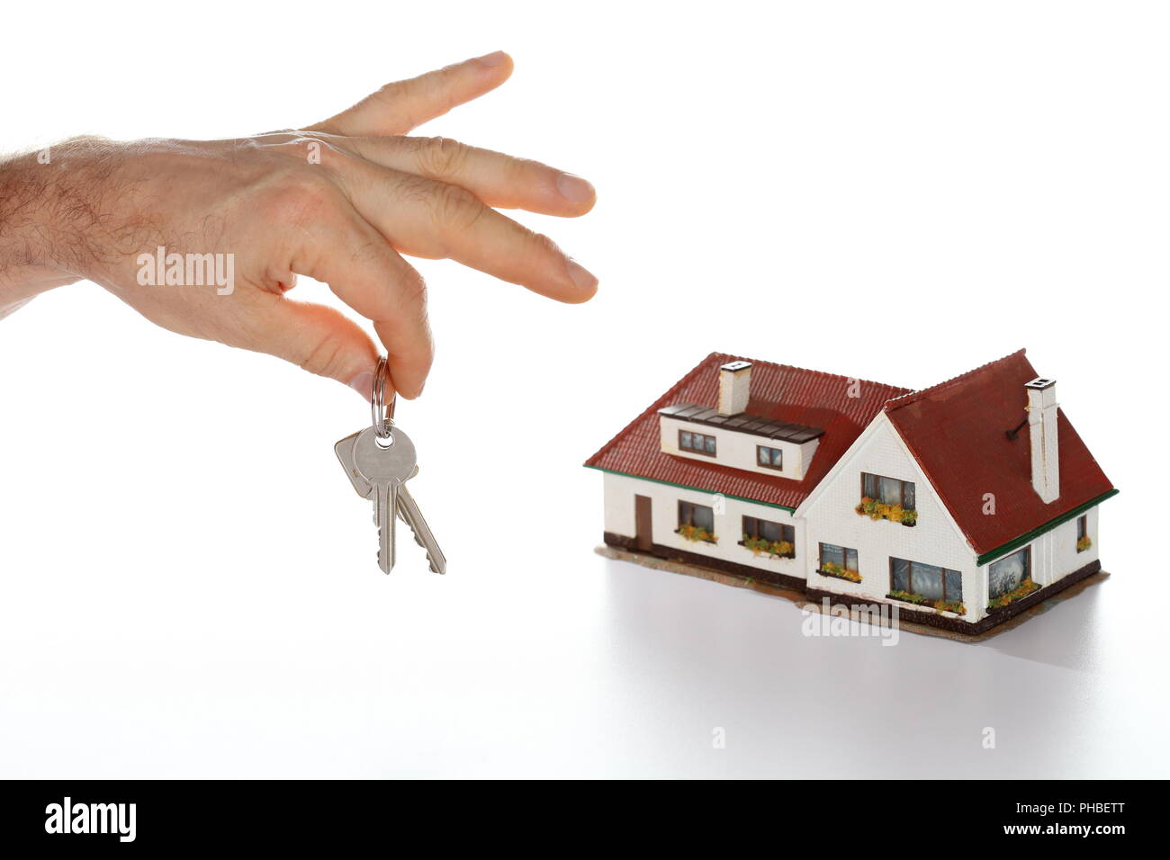 Realtor key house house Cut Out Stock Images & Pictures - Alamy