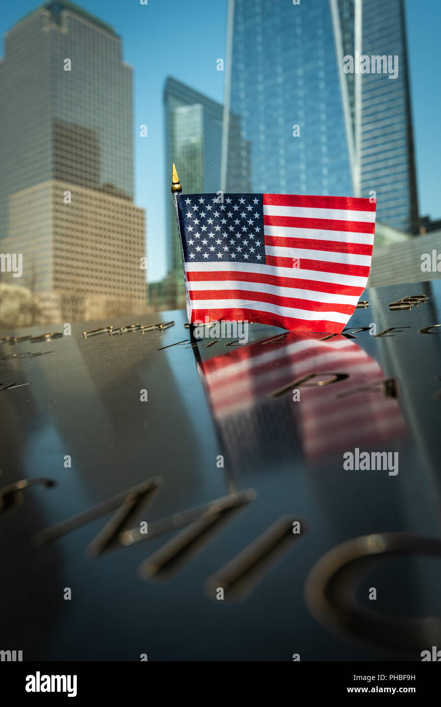 A small American flag at the 9/11 Memorial Park in New York City with ...