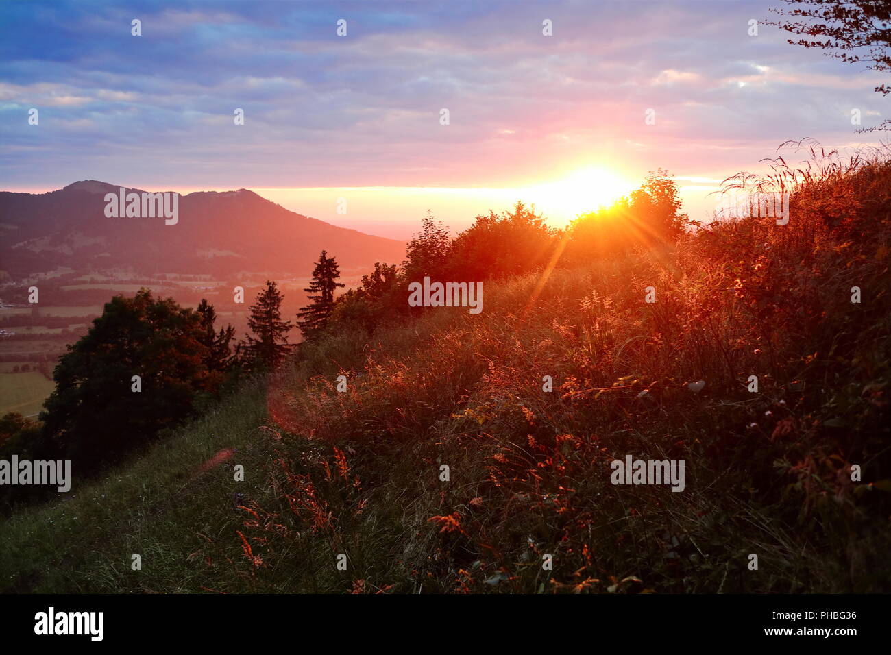 beautiful sundown in the alps Stock Photo - Alamy