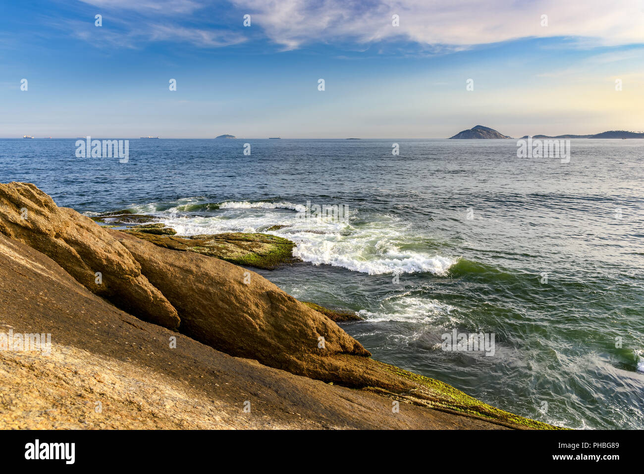 Rock and sea in Arpoador beach and Cagarras islands Stock Photo - Alamy