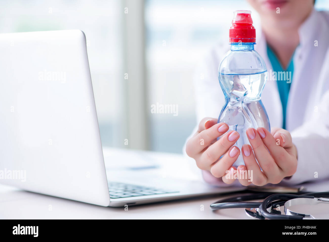 Doctor hand with fresh water in medical concept Stock Photo - Alamy