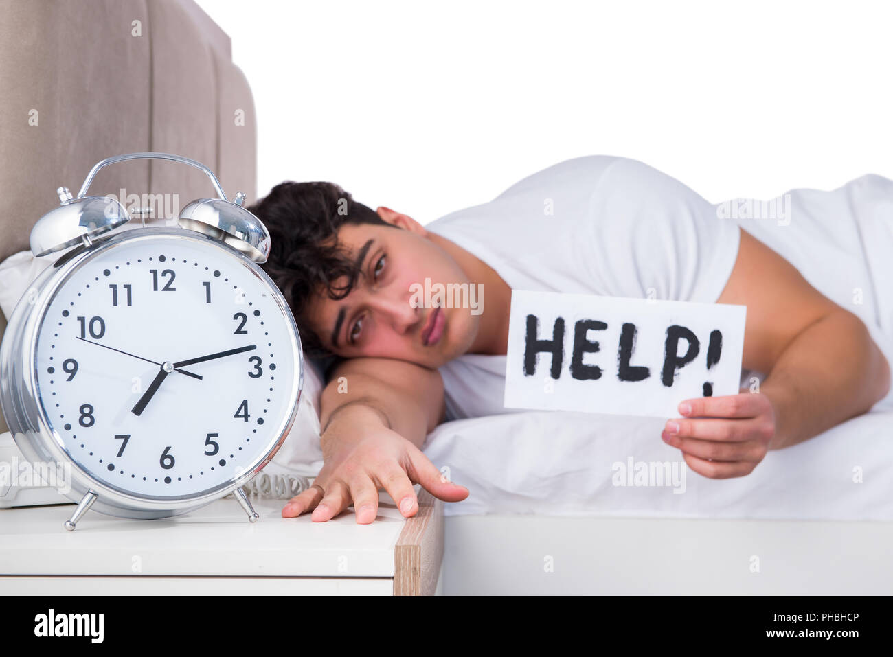 Man in bed suffering from insomnia Stock Photo - Alamy