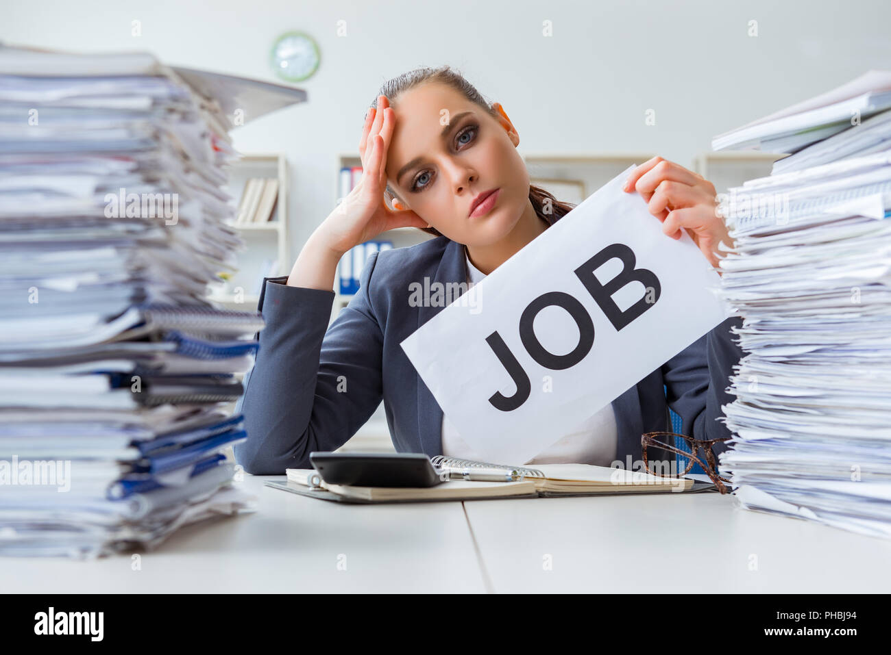 Businesswoman not coping with workload and resigning Stock Photo - Alamy