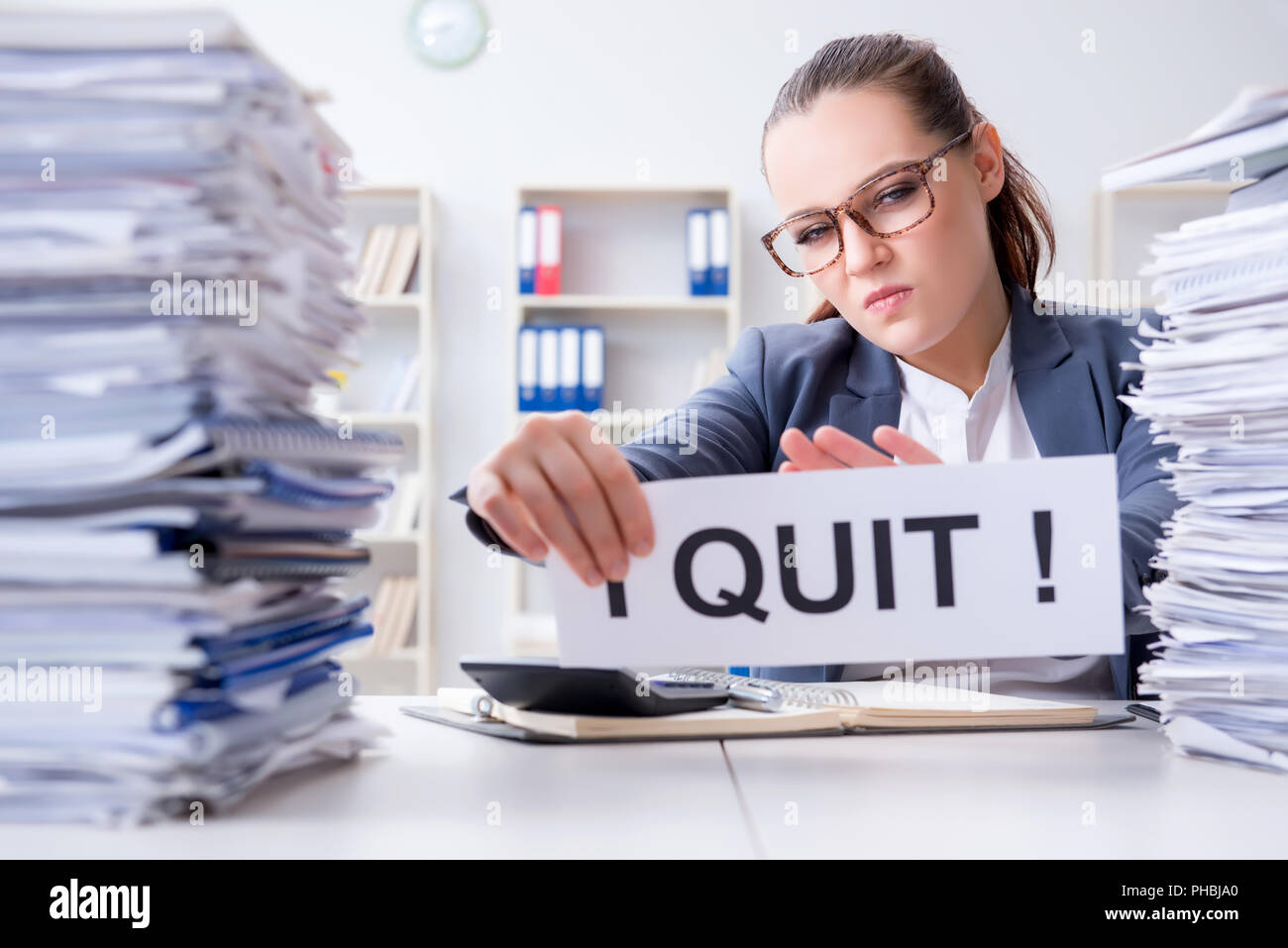 Businesswoman not coping with workload and resigning Stock Photo - Alamy