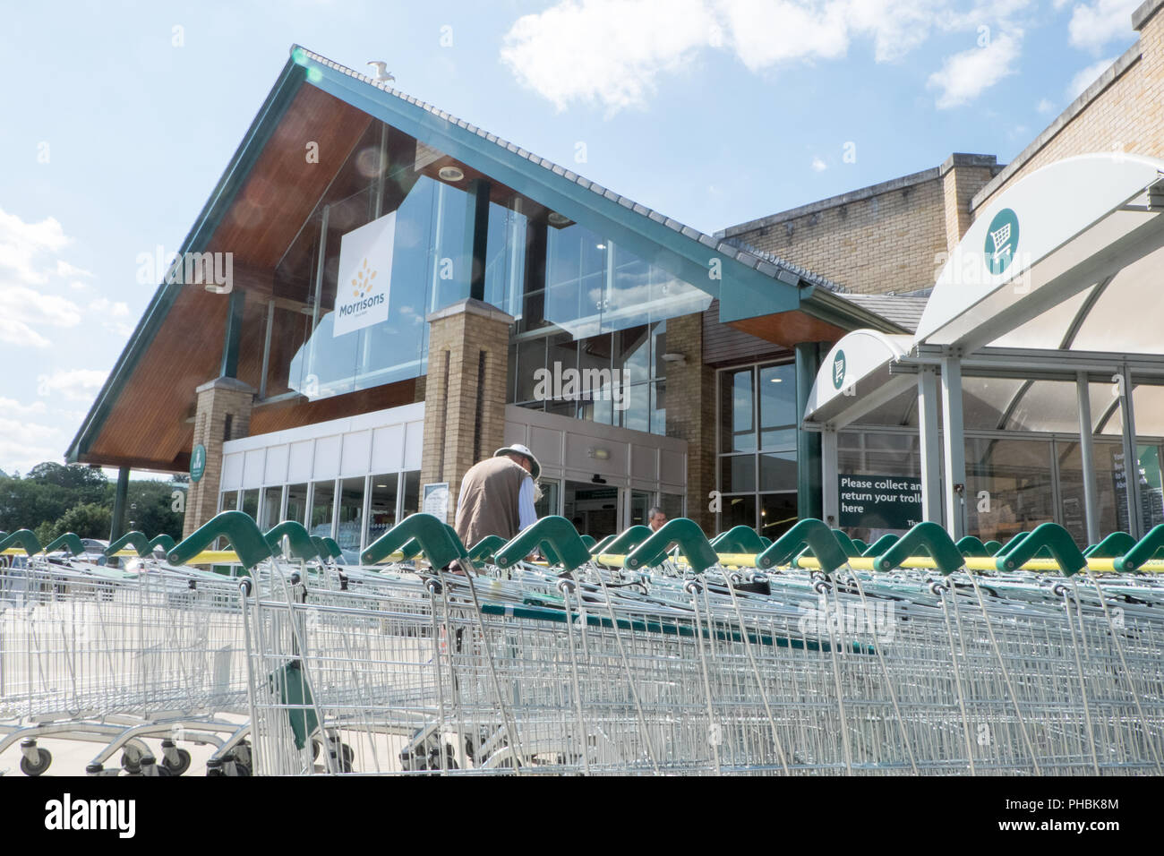 Morrisons supermarket retailer shopping trolleys hi-res stock ...