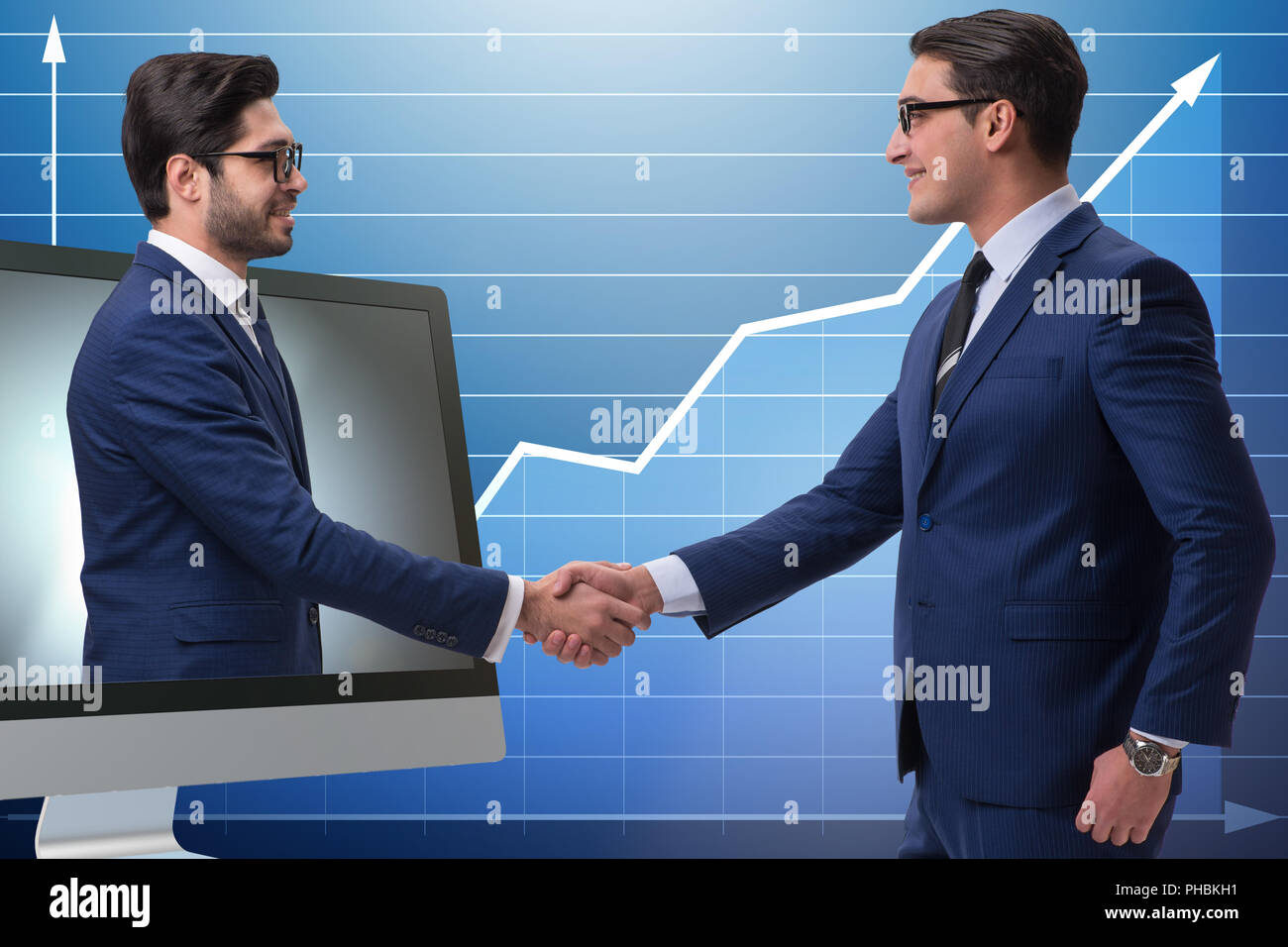 Telepresence concept with two businessman handshaking Stock Photo - Alamy