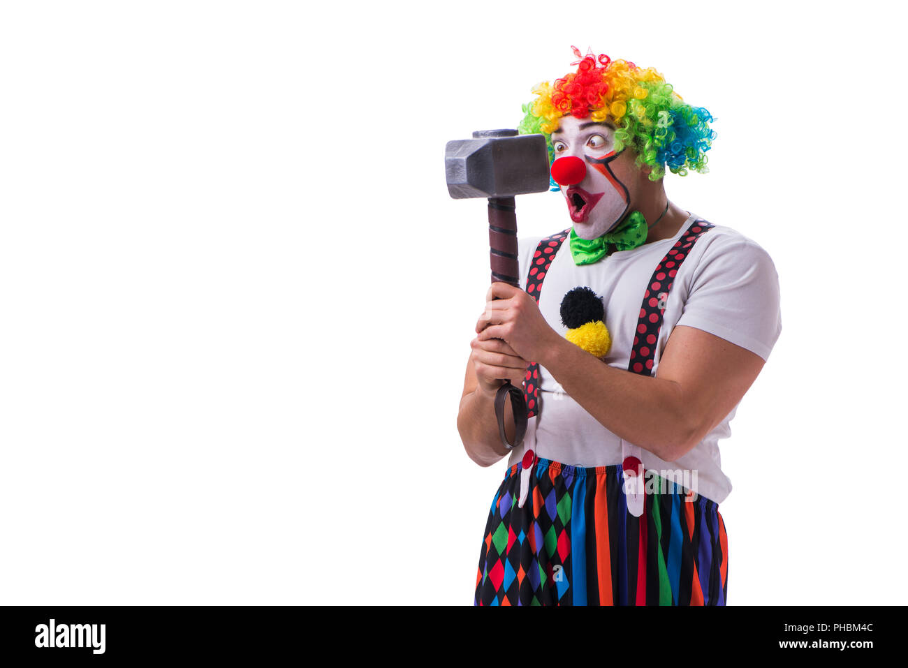Funny clown with a hammer isolated on white background Stock Photo - Alamy
