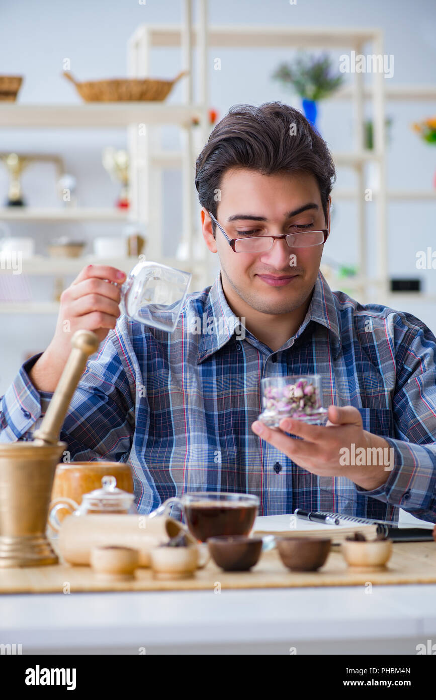 Tea expert brewing cup of drink hi-res stock photography and images - Alamy