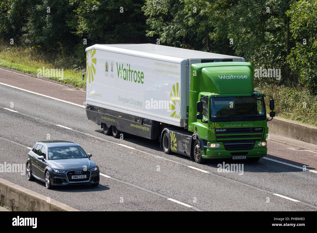 Heavy goods lorries logistics transport vehicles on the M6 at Lancaster ...