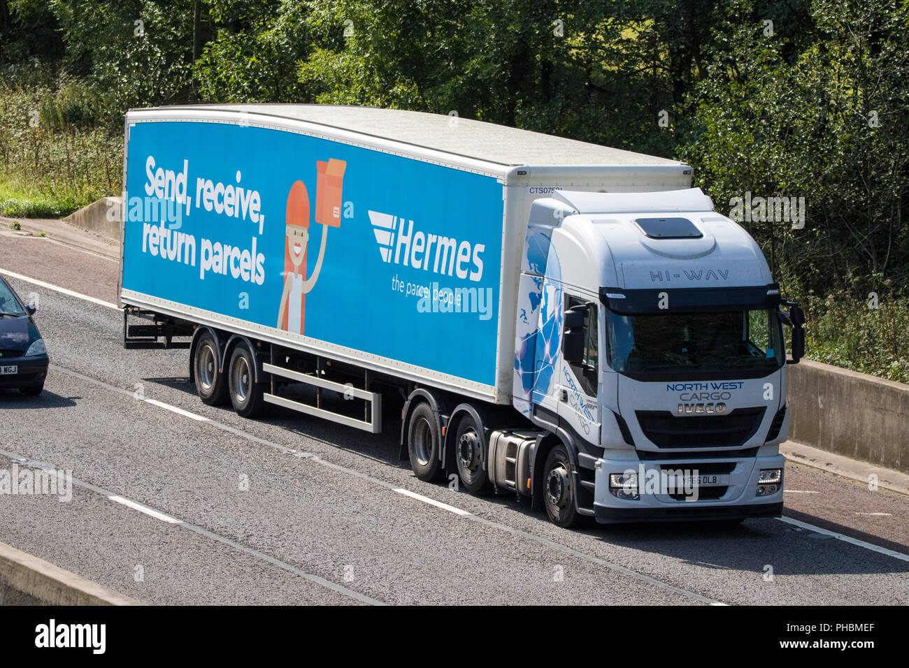 Heavy goods lorries logistics transport vehicles on the M6 at Lancaster ...