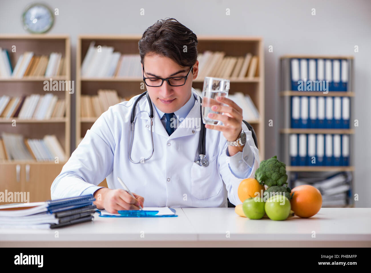Scientist studying nutrition in various food Stock Photo - Alamy
