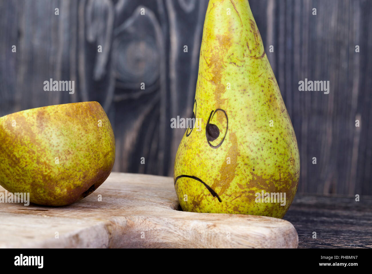 a few old green pears during the preparation of dessert, on the pear ...