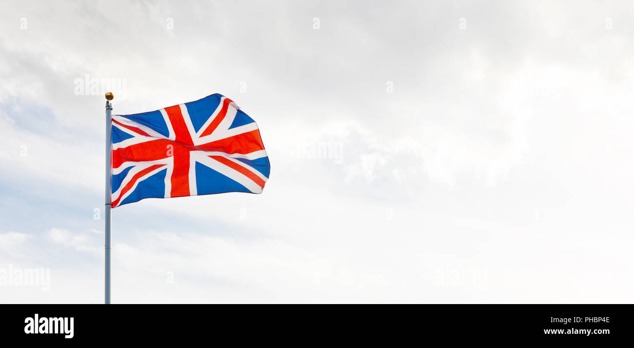 UK, Union Jack British flag waving in the wind Stock Photo - Alamy