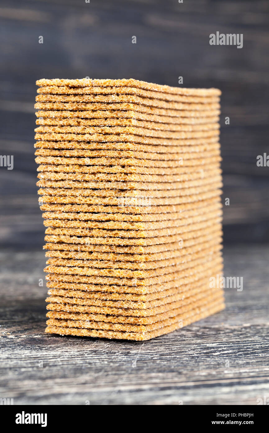 stacked together high thin crackers from rye bread, uses for food ...
