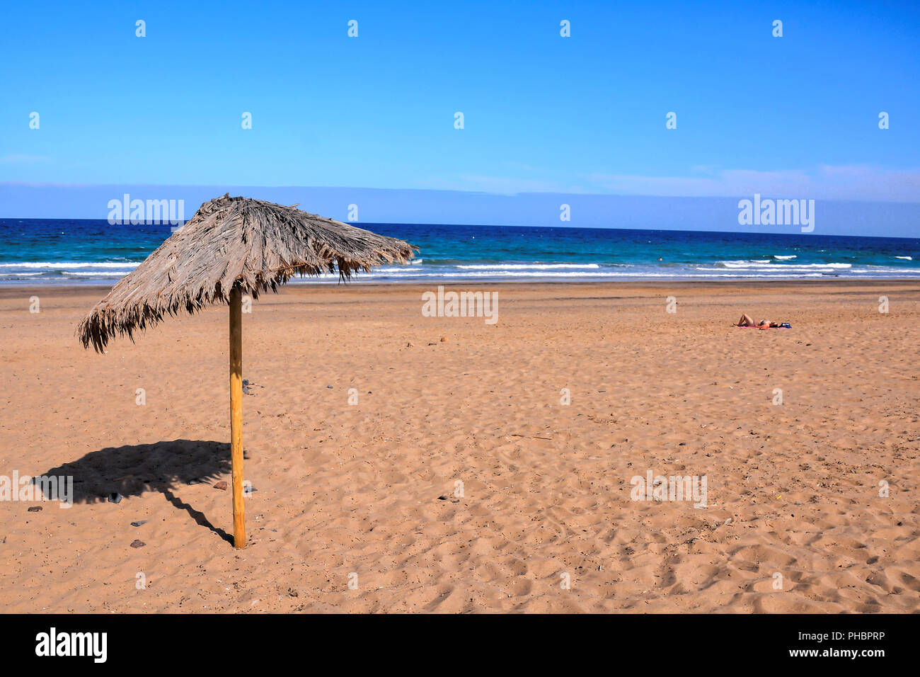 Tropical Beach Umbrella Stock Photo - Alamy