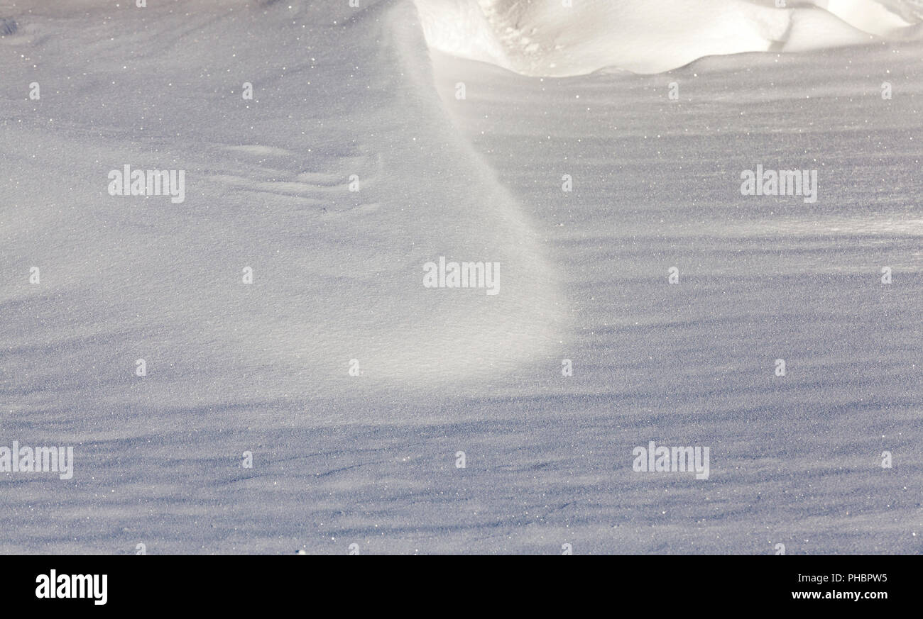 beautiful uneven snowdrift of pure snow, illuminated by sunlight Stock ...