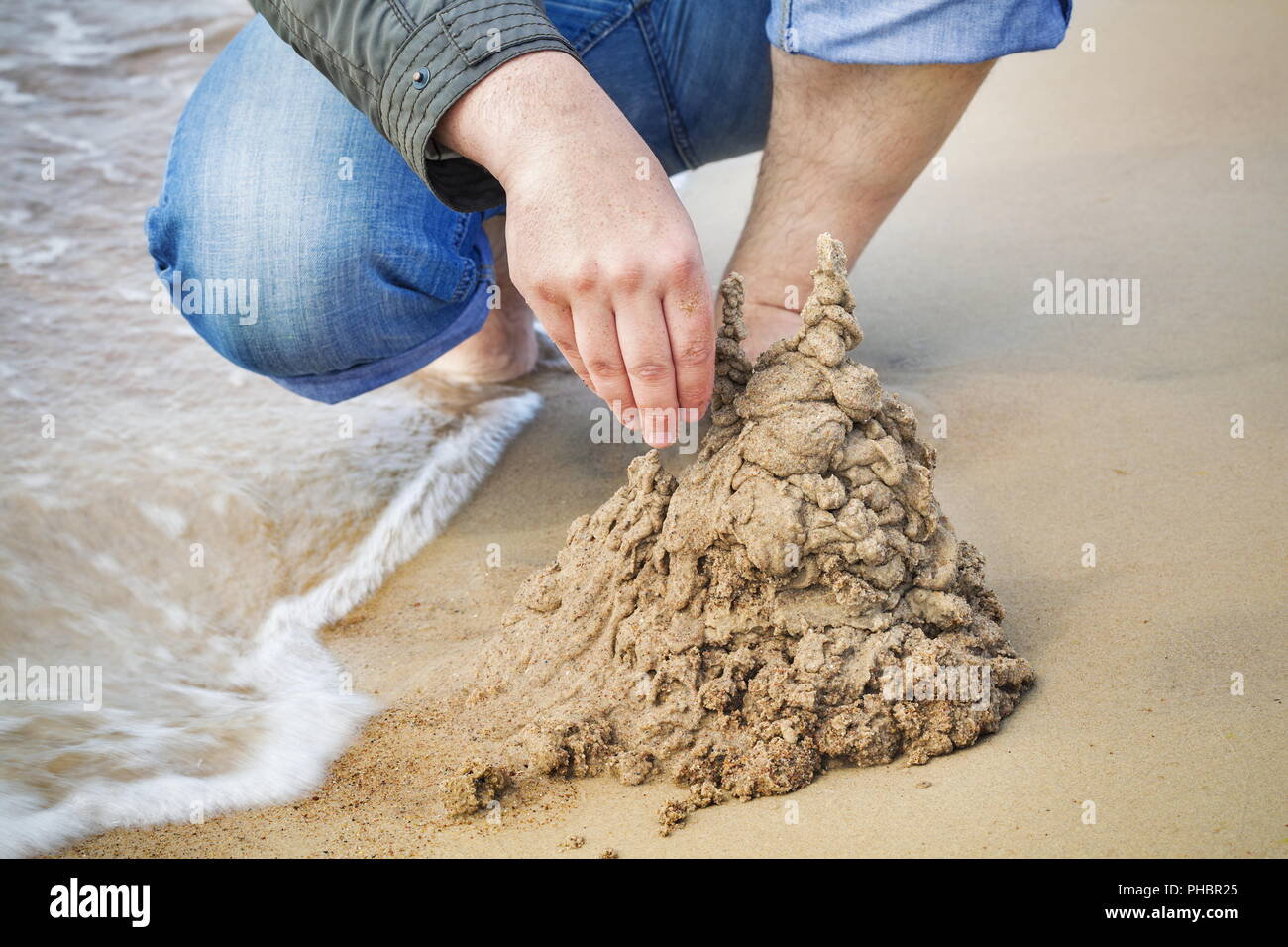 Man built sand castle near sea Stock Photo - Alamy
