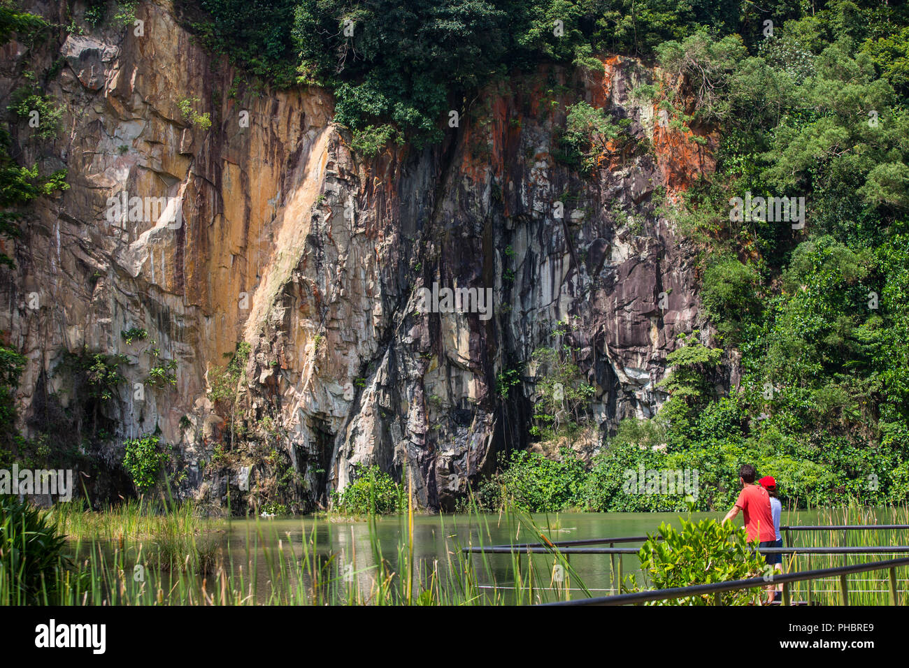 A couple admiring the beautiful and peaceful quarry nature scenery in ...