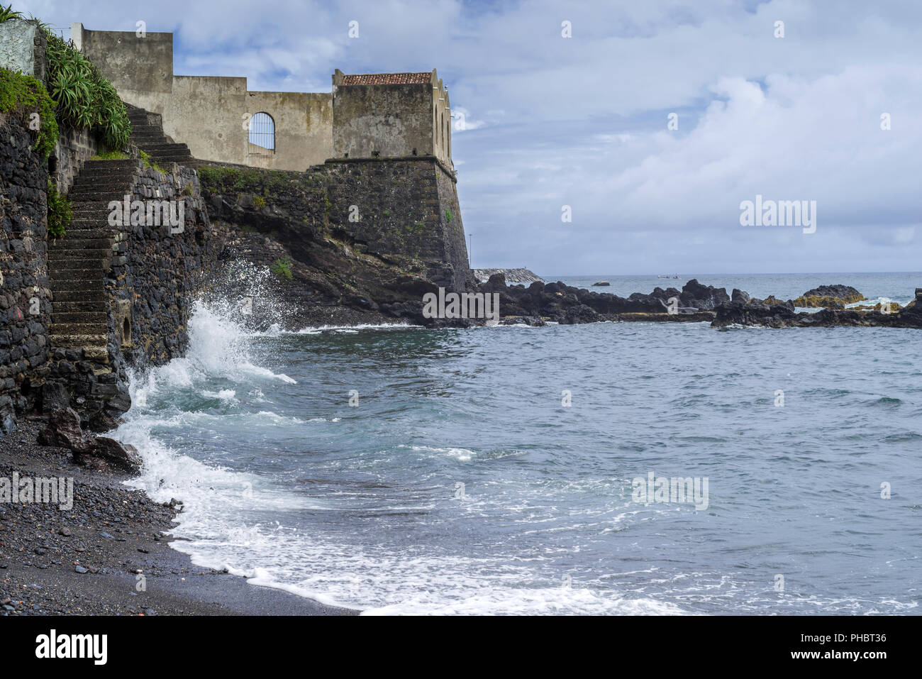 Stone house by the sea Stock Photo - Alamy