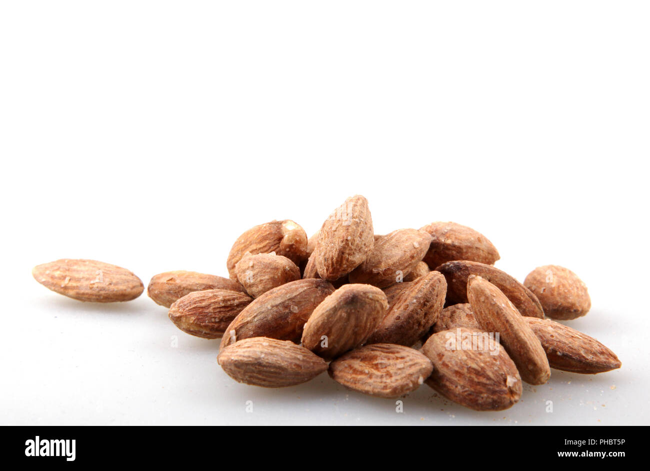 Almonds isolated on white Stock Photo - Alamy