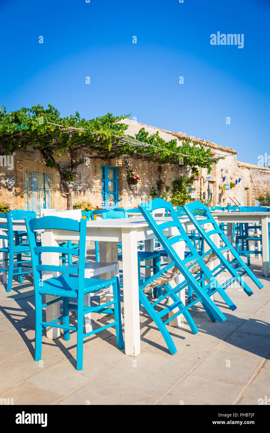 Tables in a traditional Italian Restaurant in Sicily Stock Photo - Alamy