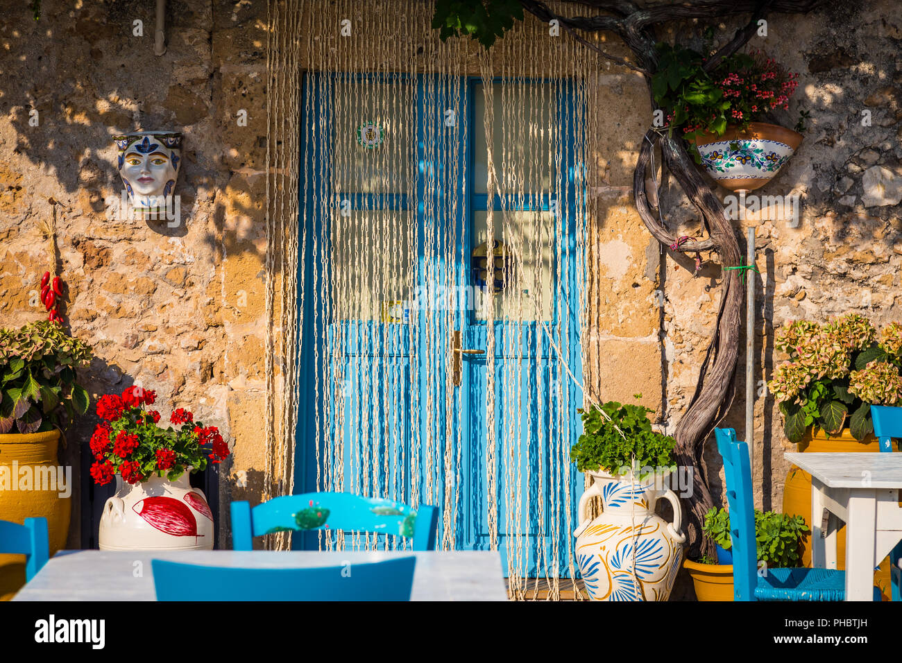 Tables in a traditional Italian Restaurant in Sicily Stock Photo - Alamy