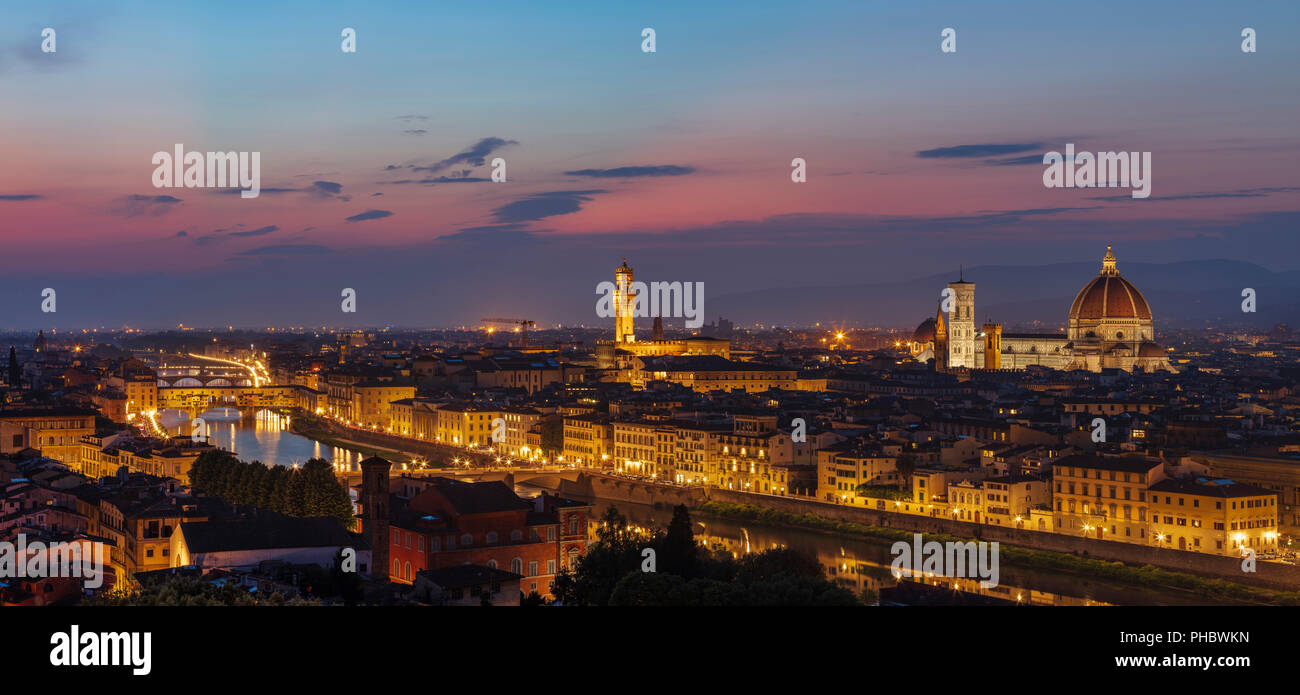 Panorama of the Florence skyline at dusk with the Palazzo Vecchio ...