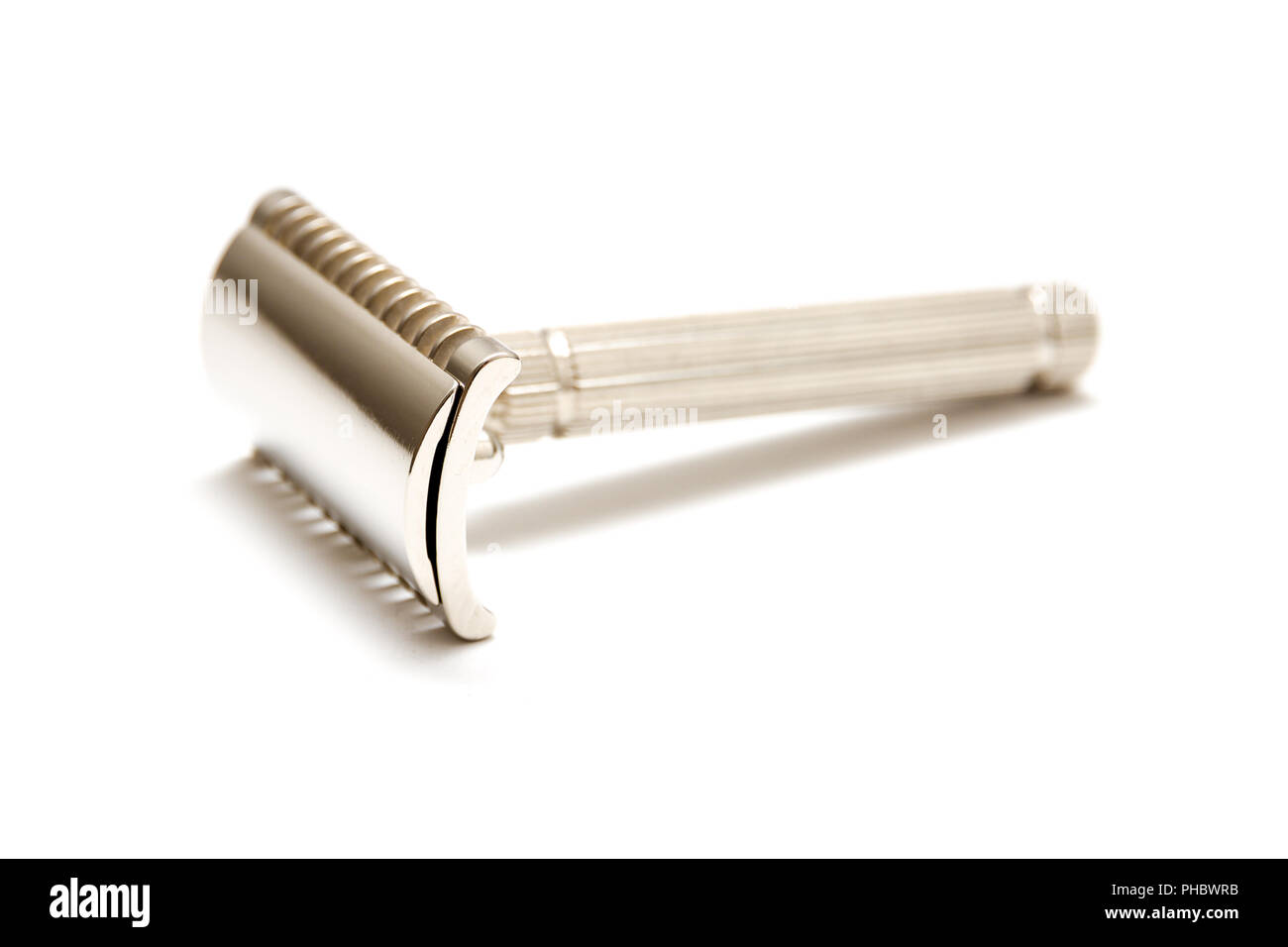 Traditional double edge open comb safety razor isolated on white ...