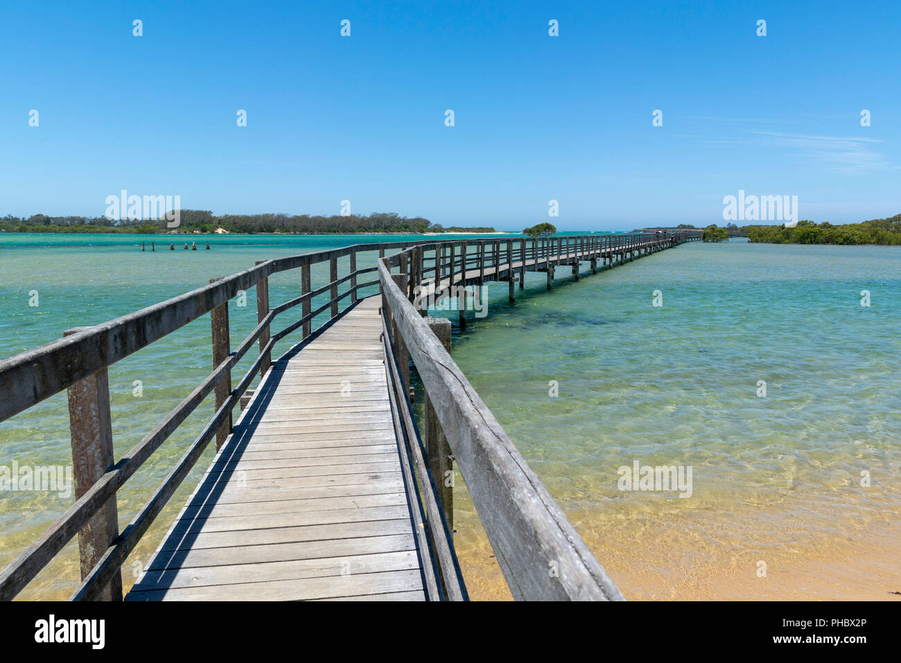 Ocean boardwalk in Urunga on the Coffs Coast stretching along the banks ...