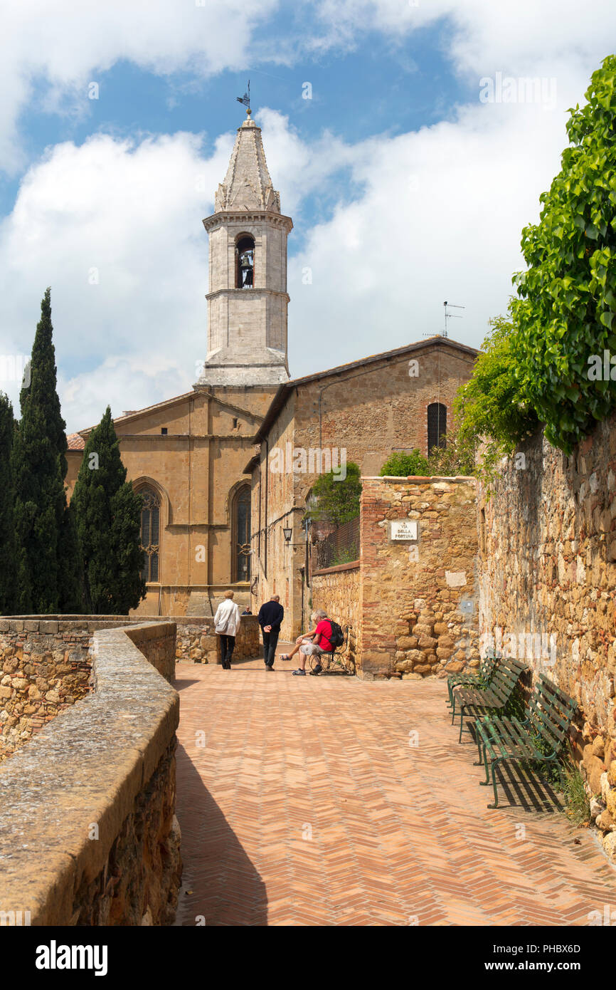 A street and view of the Cathedral tower in Pienza, UNESCO World ...