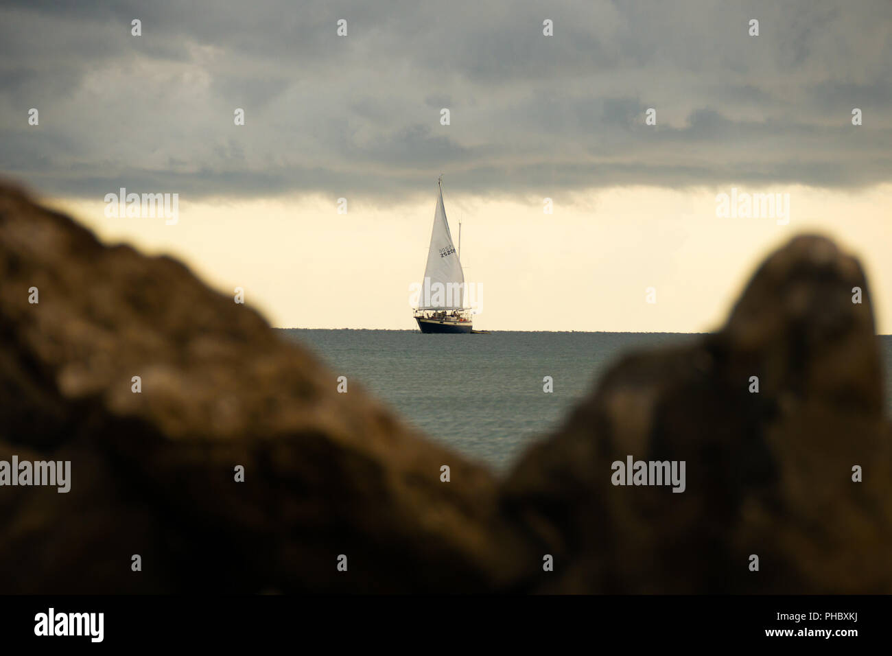 Stormy sea and sail boat hi-res stock photography and images - Alamy