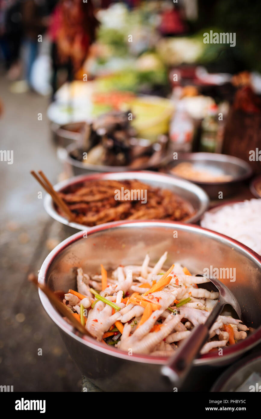 Chicken feet in bowl, Xinjie Local Market, Yuanyang, Yunnan Province ...