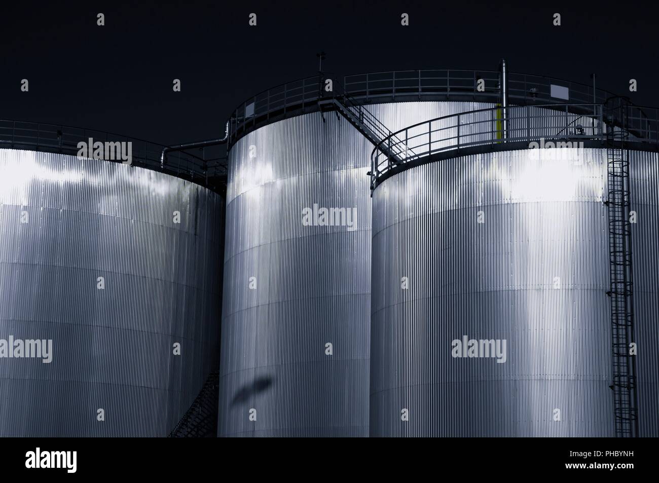 Large industrial fuel storage tanks Stock Photo - Alamy