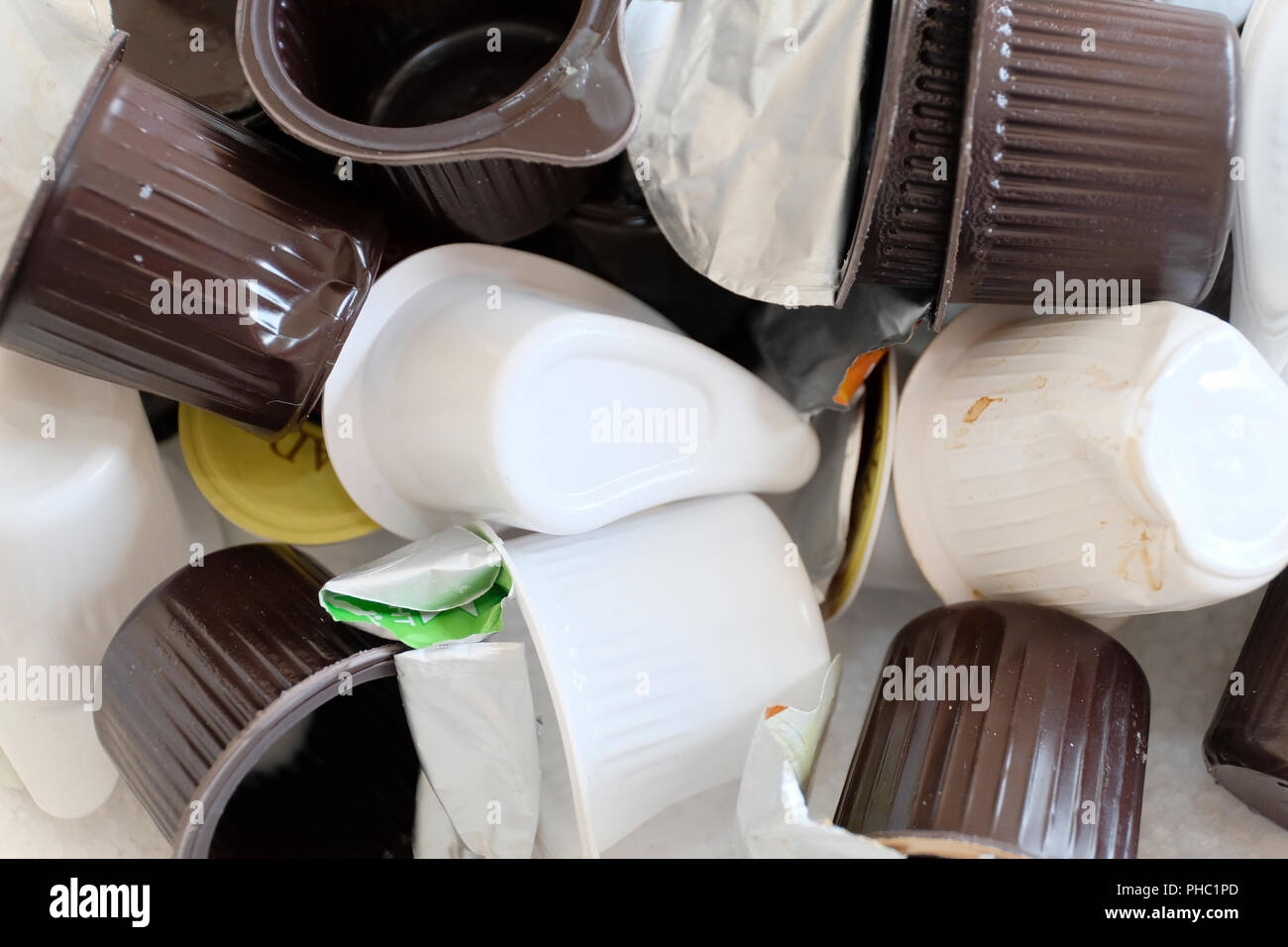 Pile of empty single use milk and cream mini cartons Stock Photo - Alamy