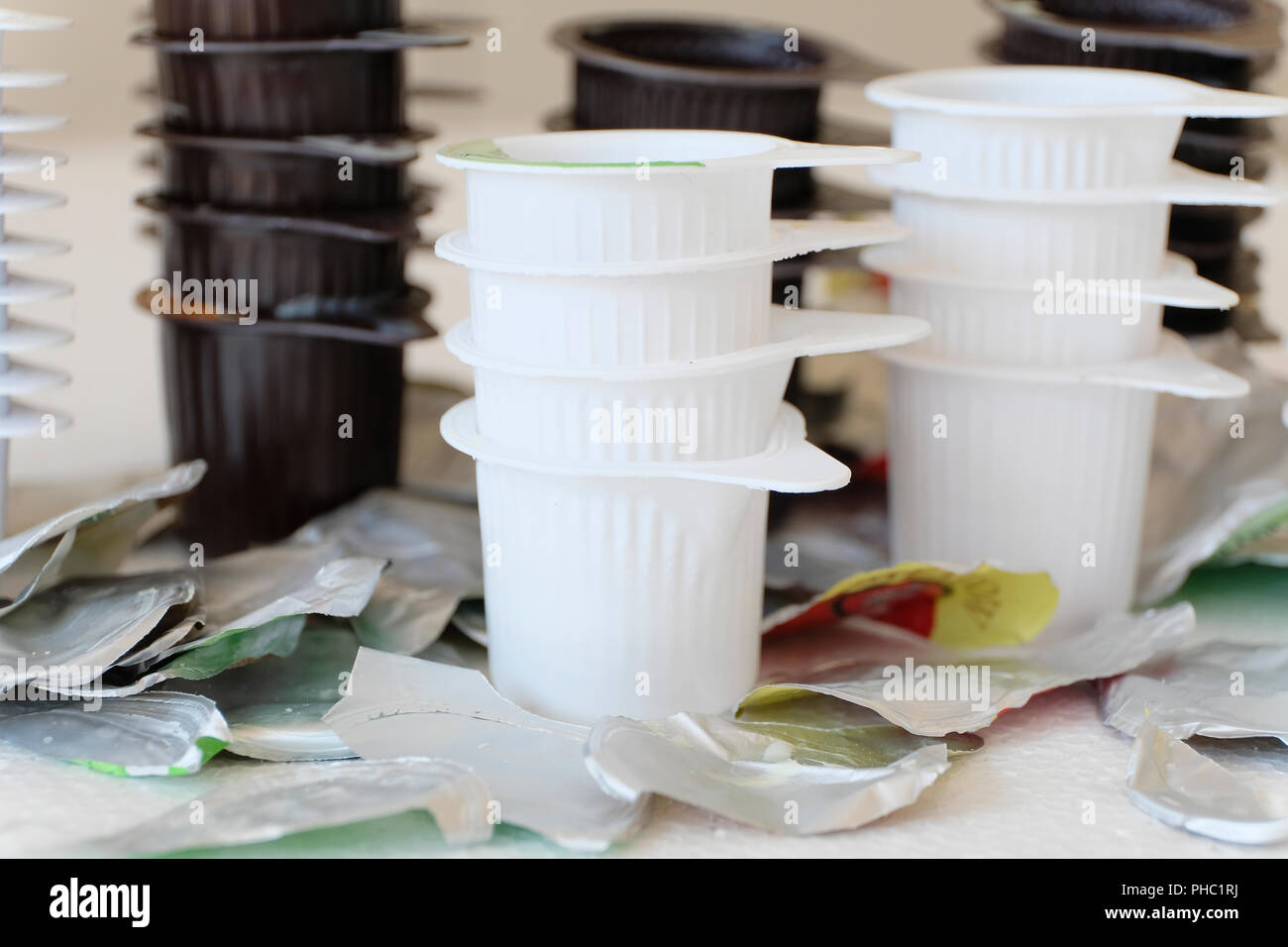 Pile of empty single use milk and cream mini cartons Stock Photo - Alamy