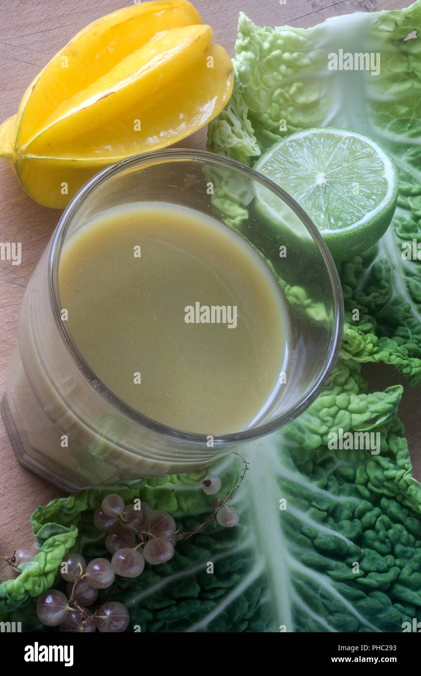 Smoothie from savoy cabbage and star fruits Stock Photo - Alamy