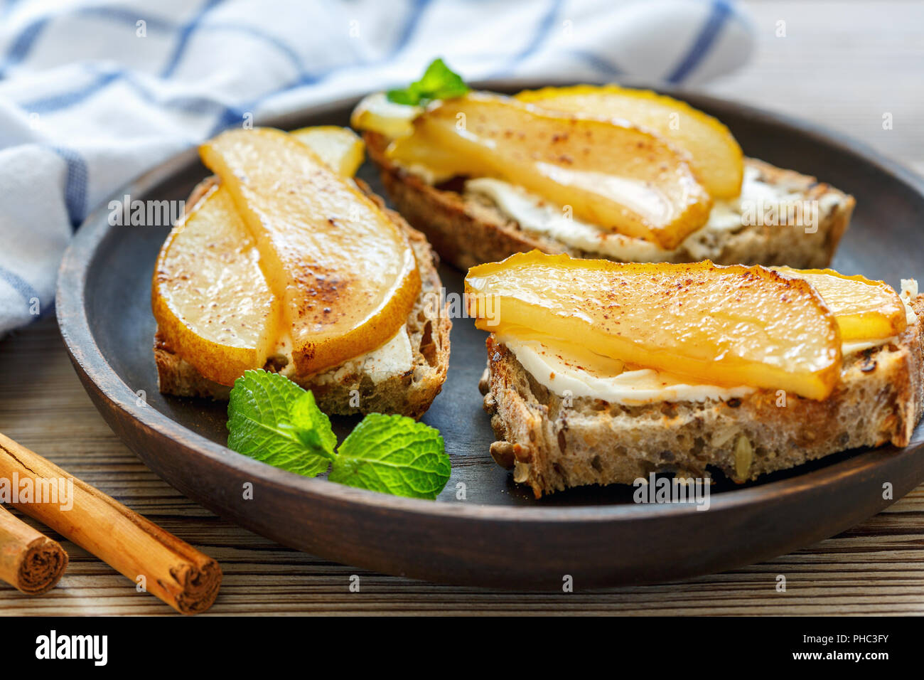 Crostini homemade bread, ricotta and pear Stock Photo - Alamy