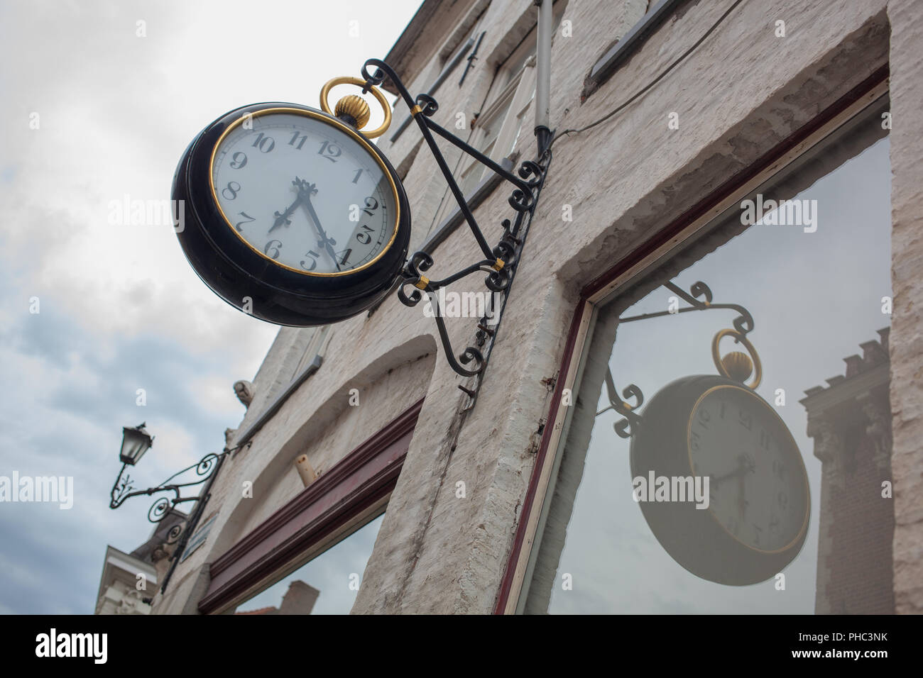 Vintage style street clock view Stock Photo - Alamy